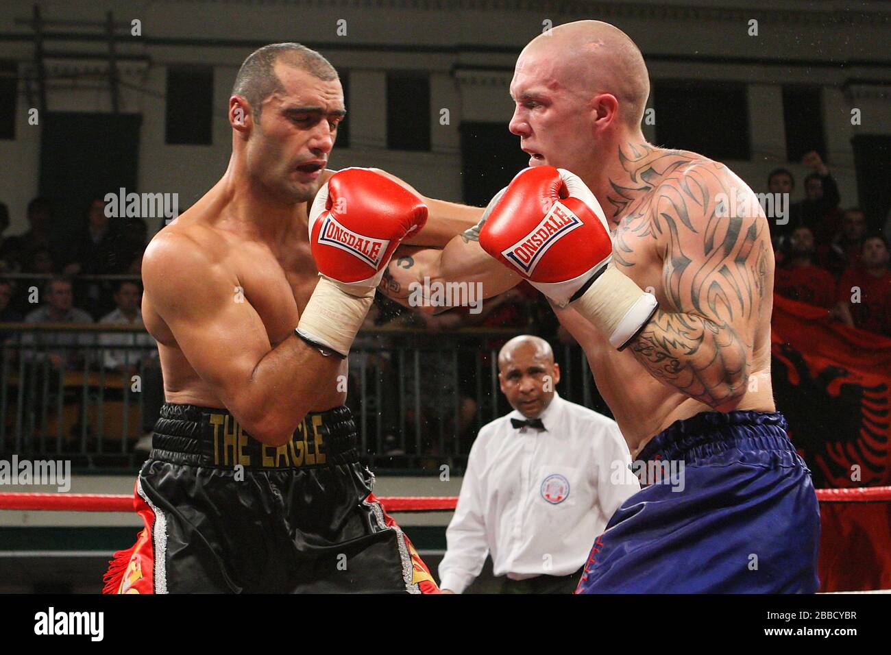 Kreshnik Qato (red/black shorts) defeats Terry Carrithers in a ...