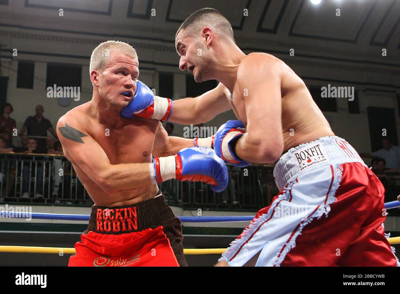 Ediz Hussein (claret/blue shorts) defeats Robin Deakin (red/black ...