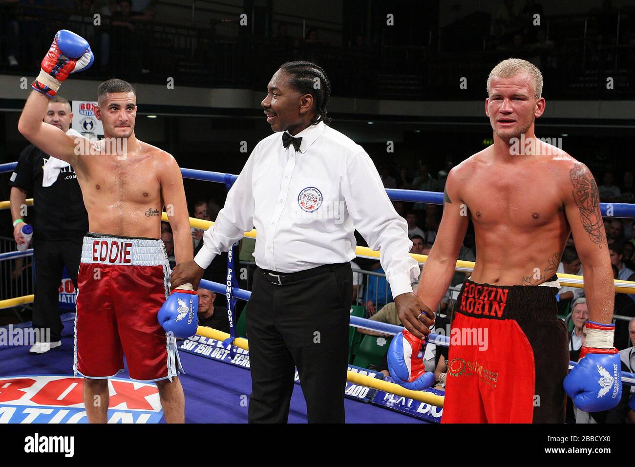 Ediz Hussein (claret/blue shorts) defeats Robin Deakin (red/black ...