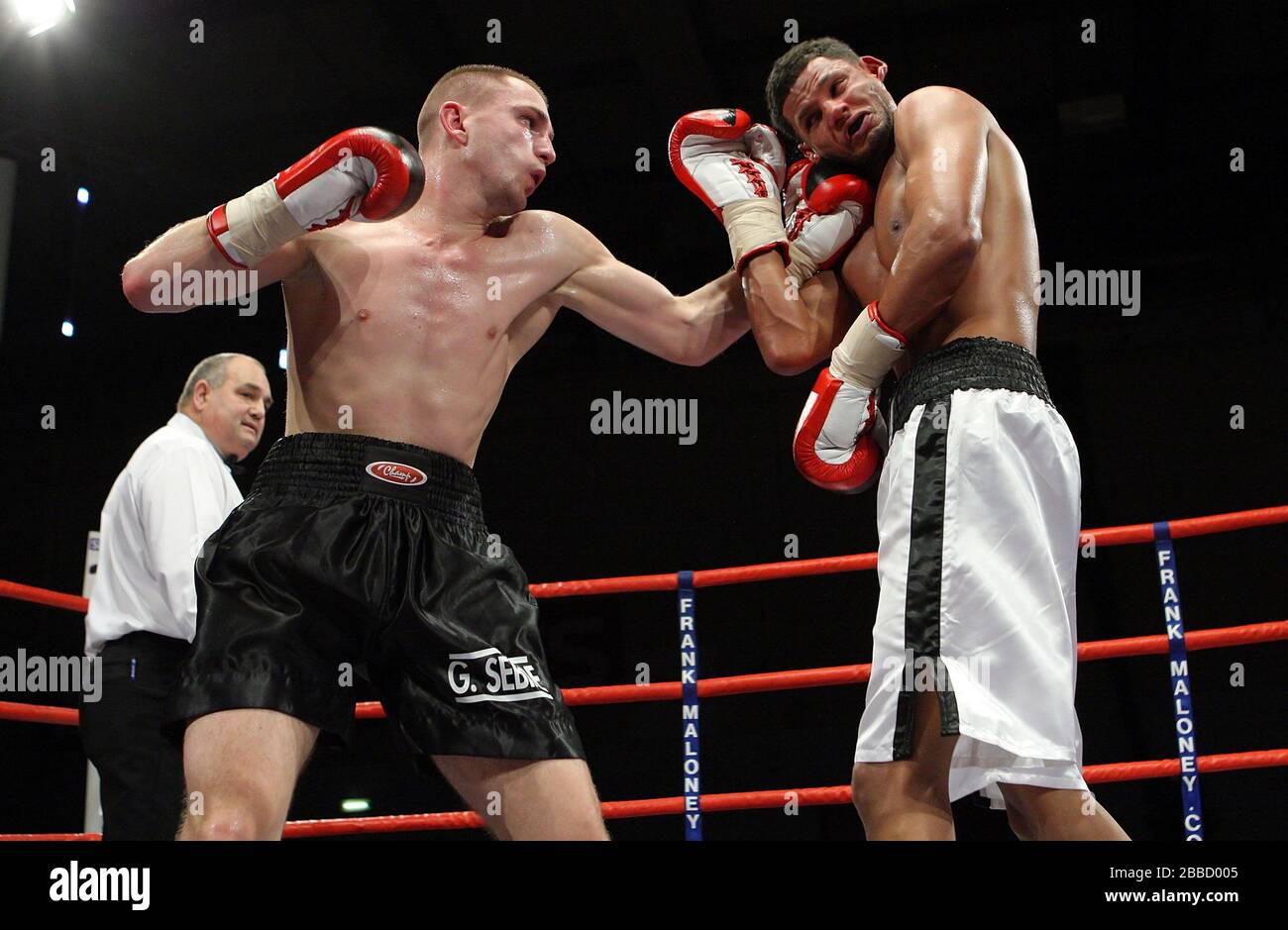 Christopher Sebire (France, black shorts) defeats Robert Lloyd Taylor ...