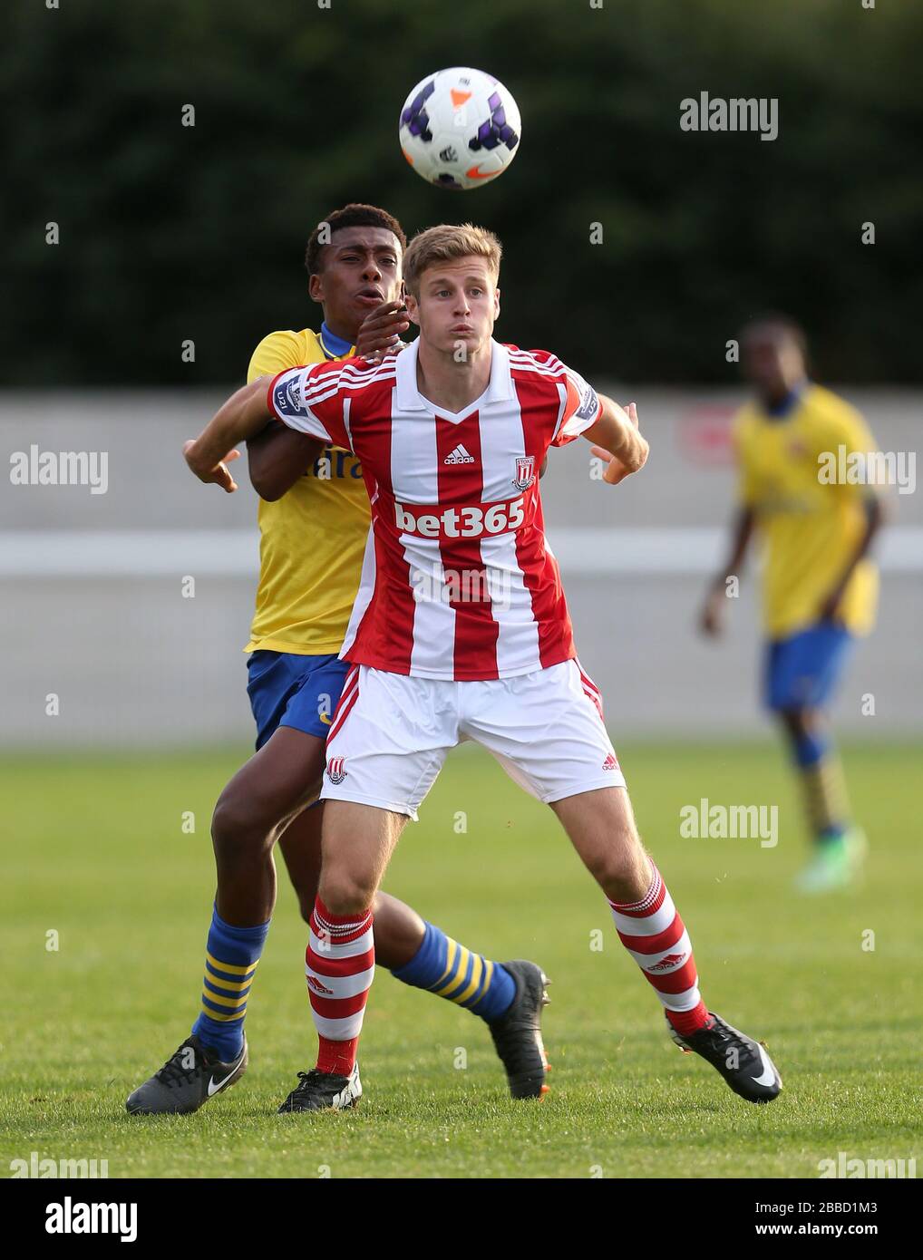 Stoke City's Elliot Wheeler and Arsenal's Alex Iwobi during the ...