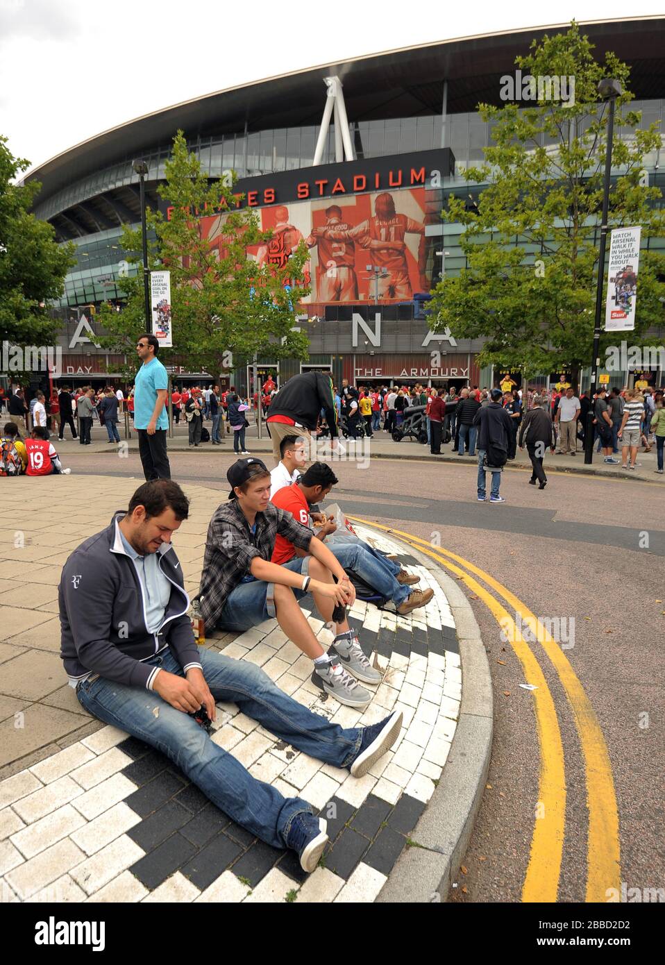 Arsenal fans make their way to the Emirates stadium before kick off ...