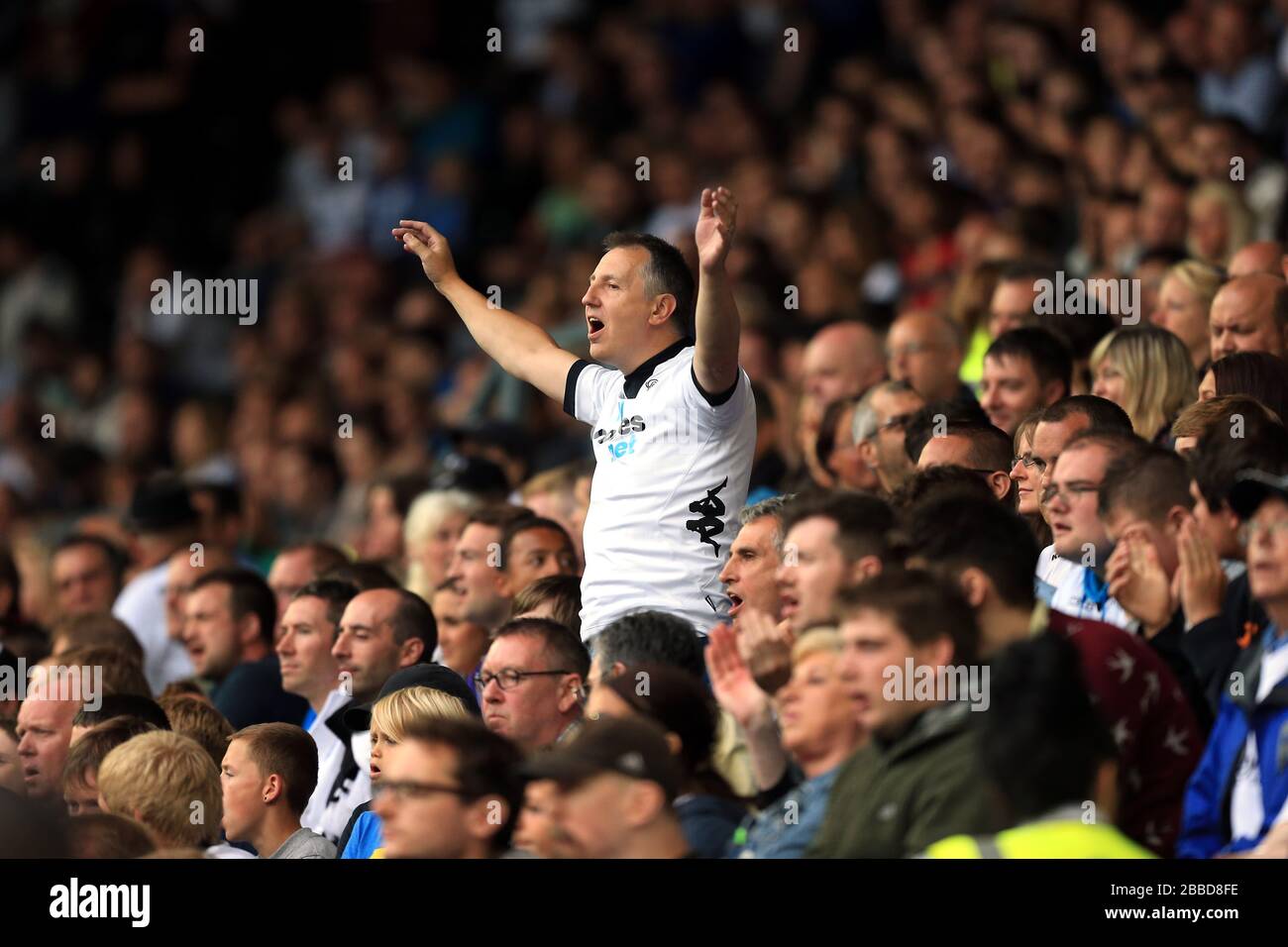 A Derby County fan cheers on his team Stock Photo - Alamy