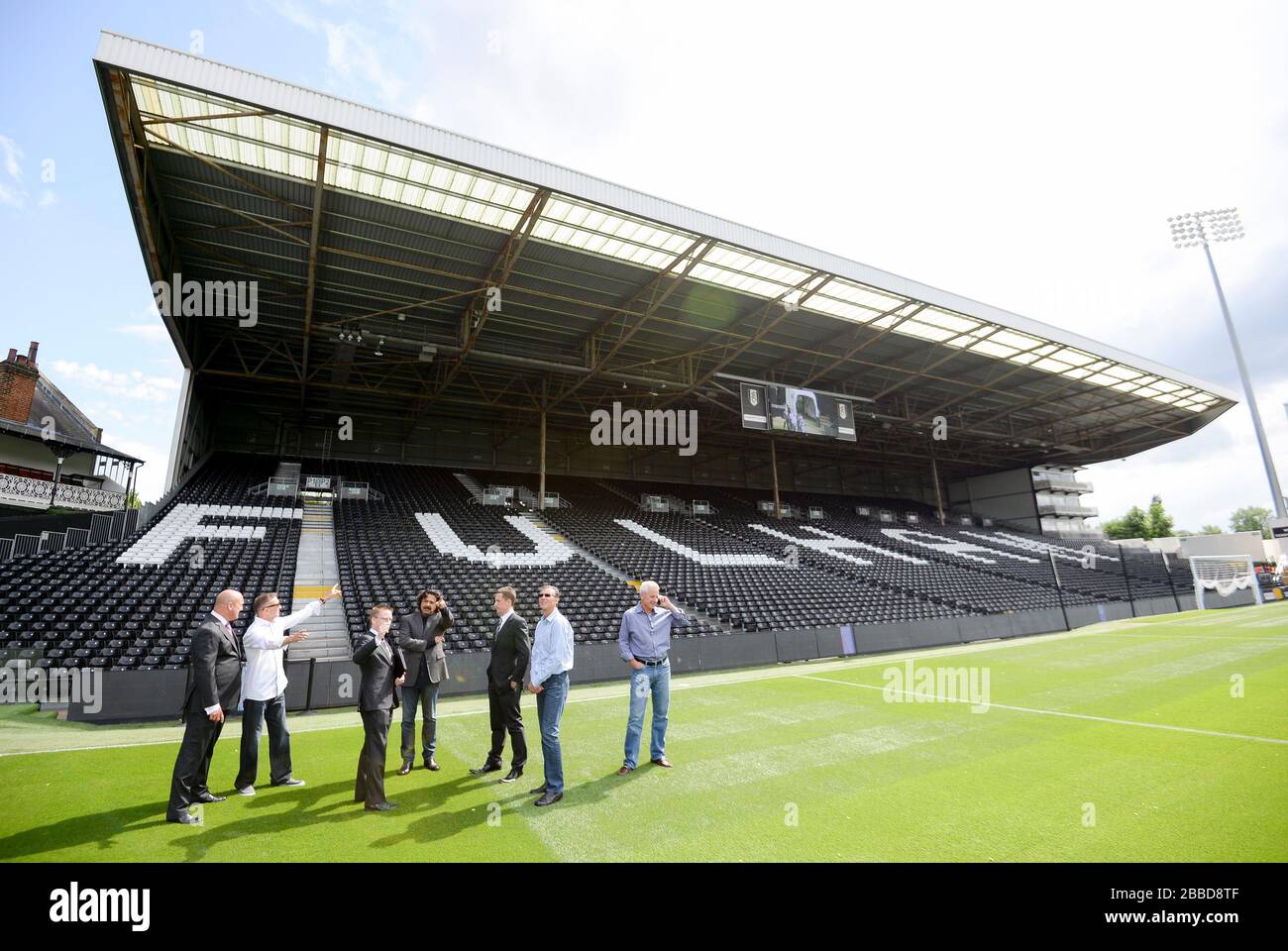 New Fulham owner and Chairman Shahid Khan is shown around the ground ...