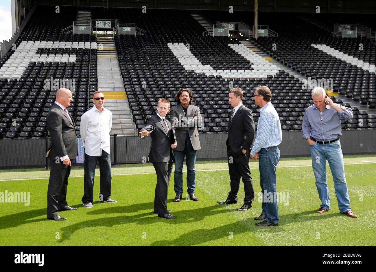 New Fulham owner and Chairman Shahid Khan is shown around the ground ...