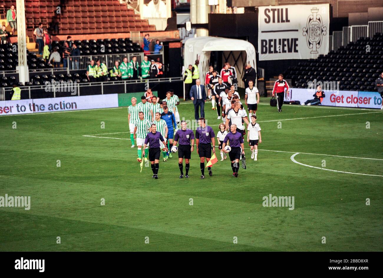 The teams come out for the start of the match Stock Photo - Alamy