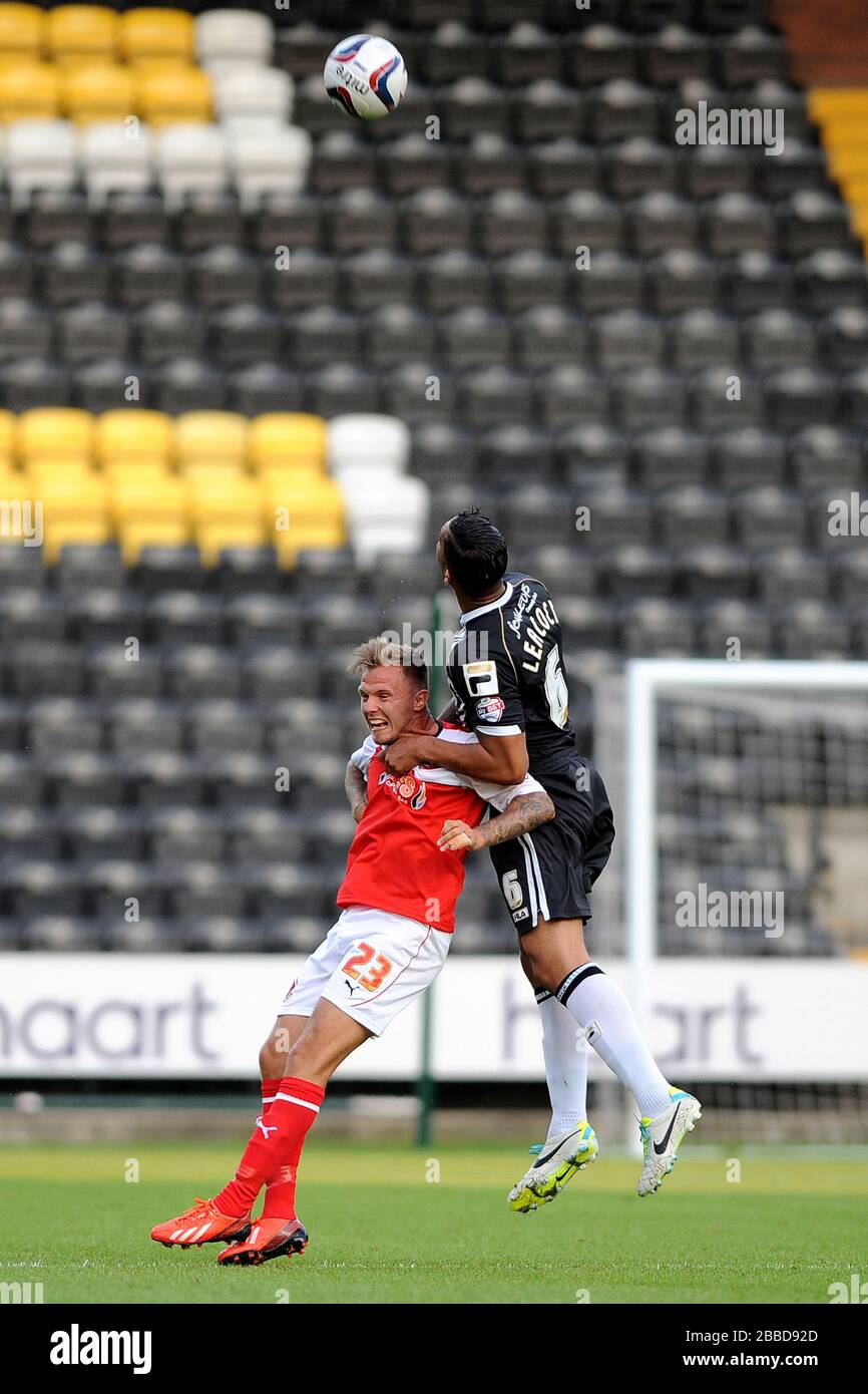 Fleetwood Town's David Ball (left) is challenged by Notts County's Dean ...