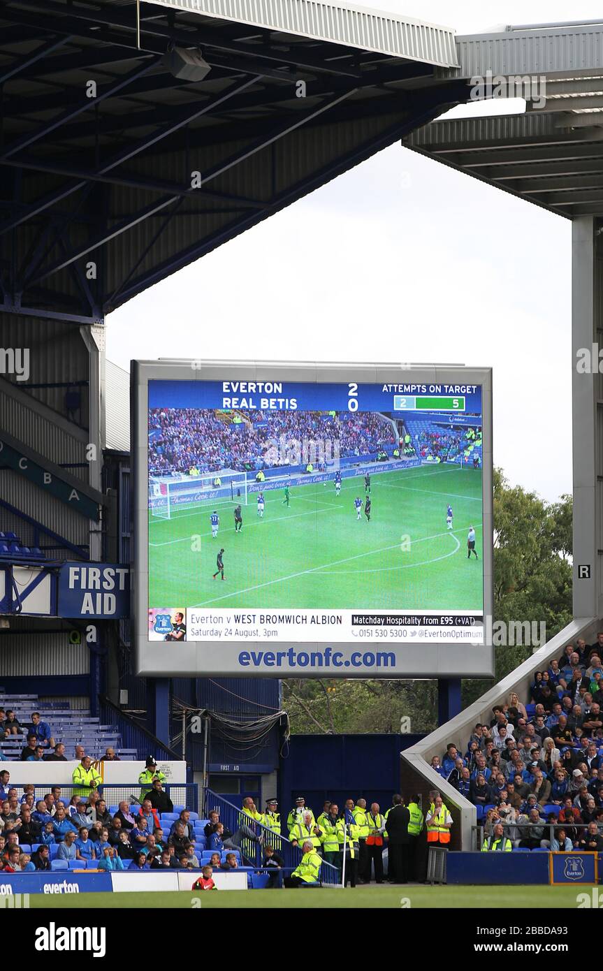 The giant screen showes live footage of the match Stock Photo - Alamy