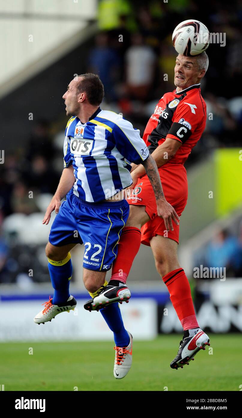St Mirren's Jim Goodwin heads from Kilmarnock's Mark Stewart during the ...