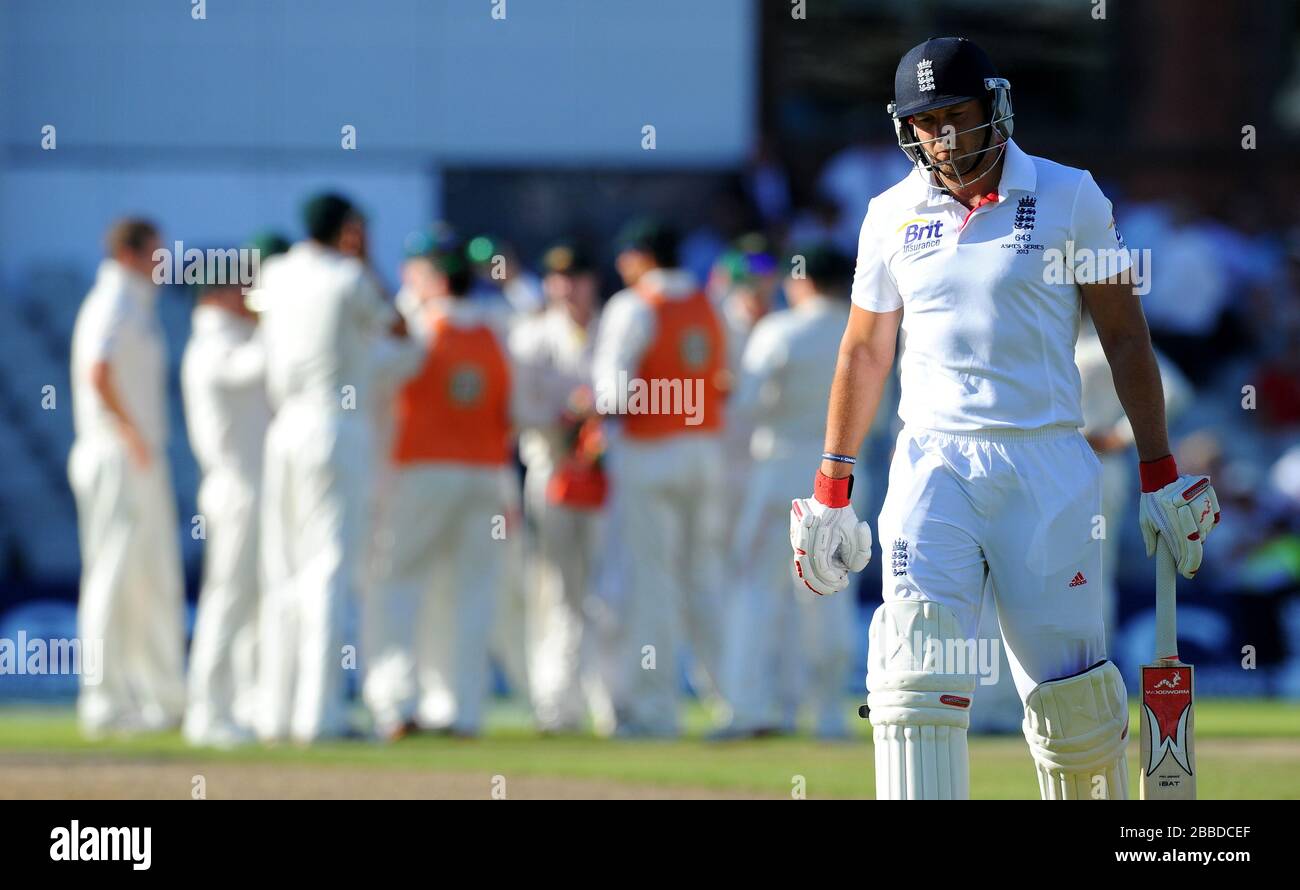 England's Tim Bresnan leaves the pitch after being caught Australia's ...