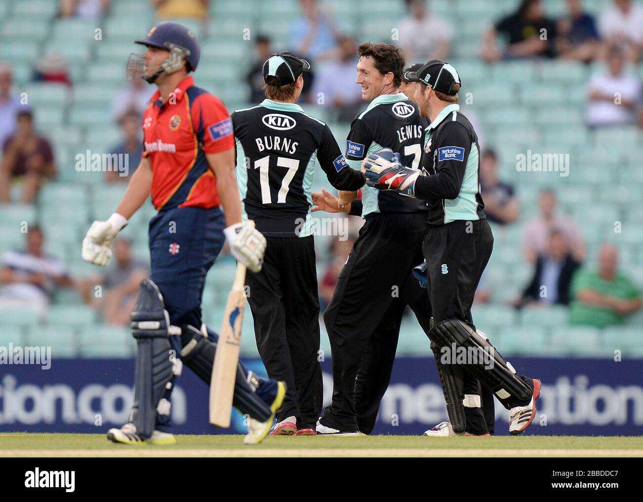 Surrey's Jon Lewis celebrates taking a wicket Stock Photo - Alamy