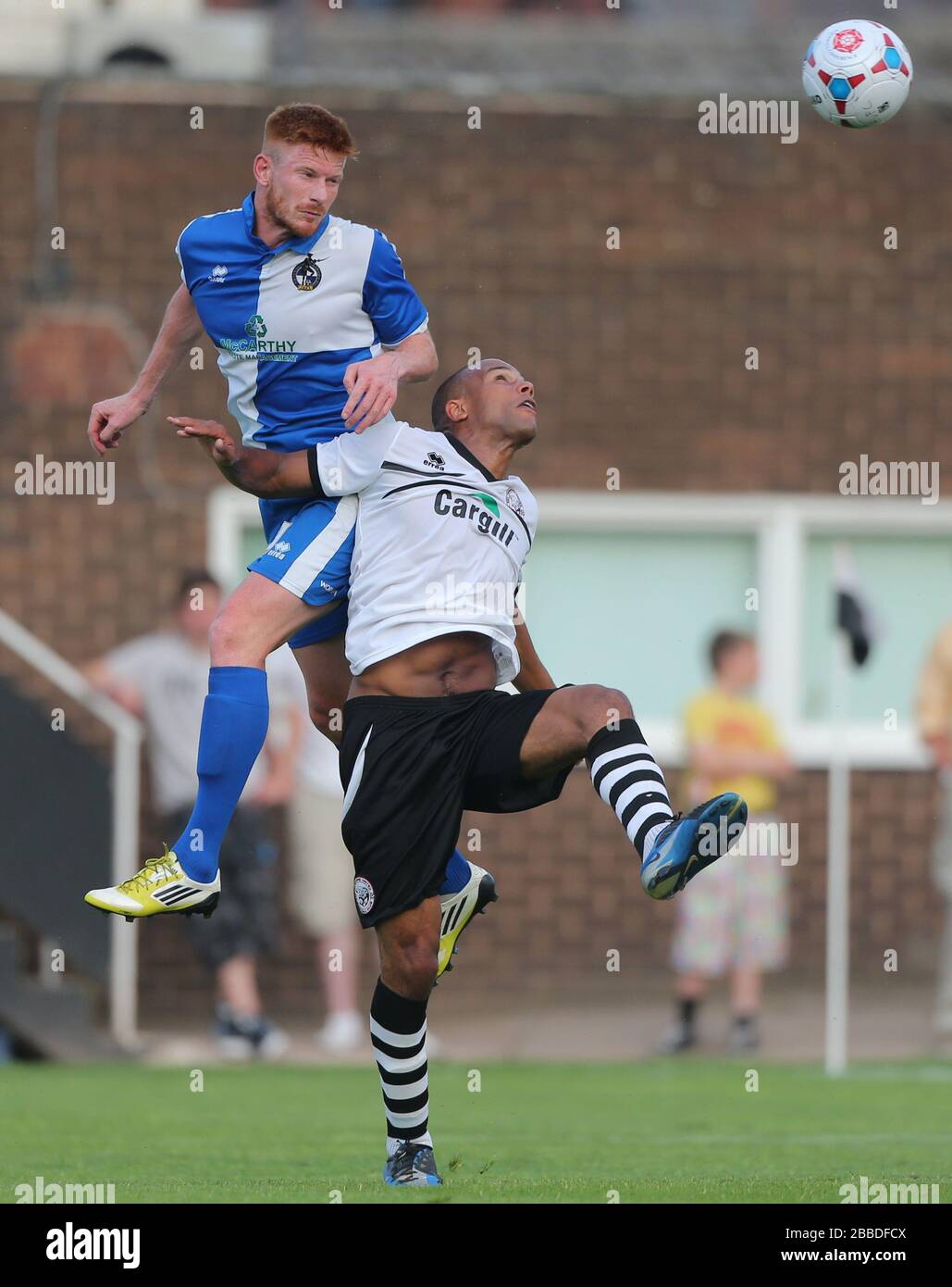 Bristol Rovers's Matt Harold wins the header over Hereford United ...