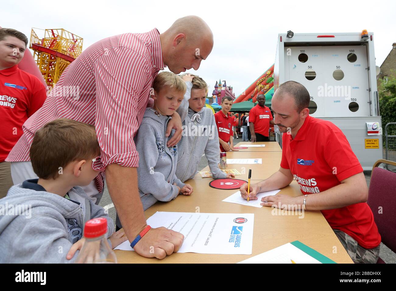 People sign up for activities outside The Valley Stock Photo - Alamy
