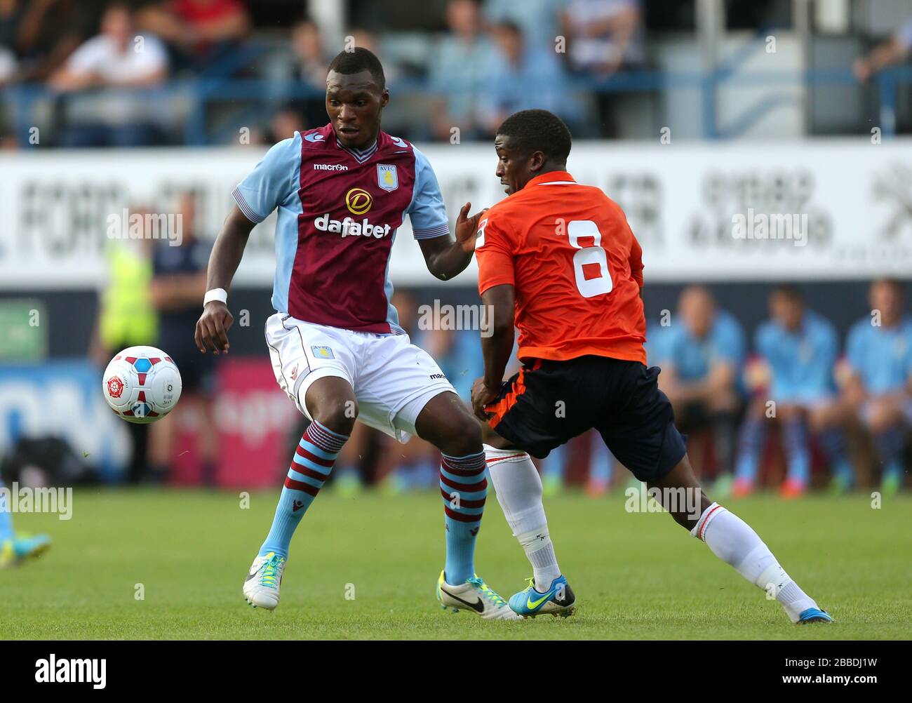 Aston Villa's Christian Benteke battles for possession of the ball with ...