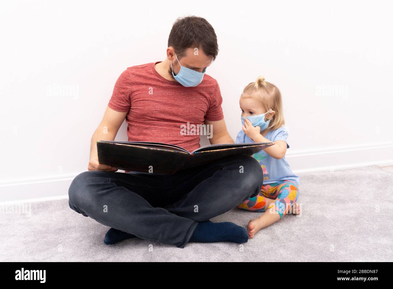 Baby and father in mask hi-res stock photography and images - Alamy