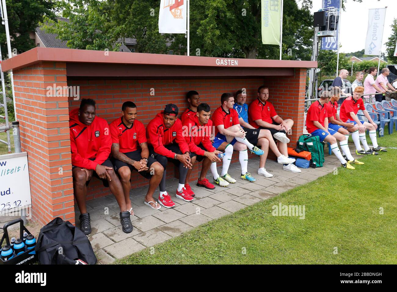 Coventry City manager Steve Pressley (blue shirt) sits in the dug out ...