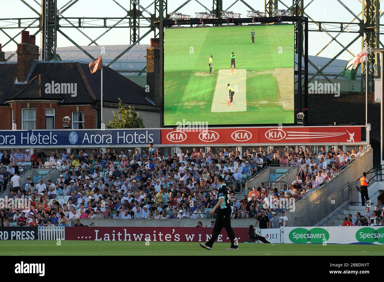 The crowd enjoy the action from the stands at the Kia Oval Stock Photo ...
