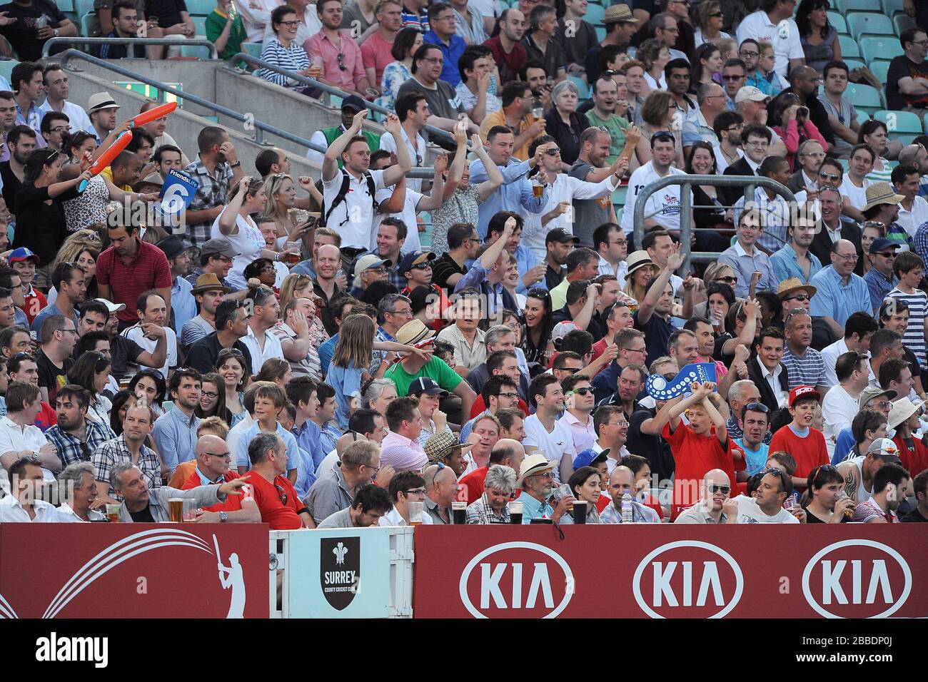 The crowd enjoy the action from the stands at the Kia Oval Stock Photo ...