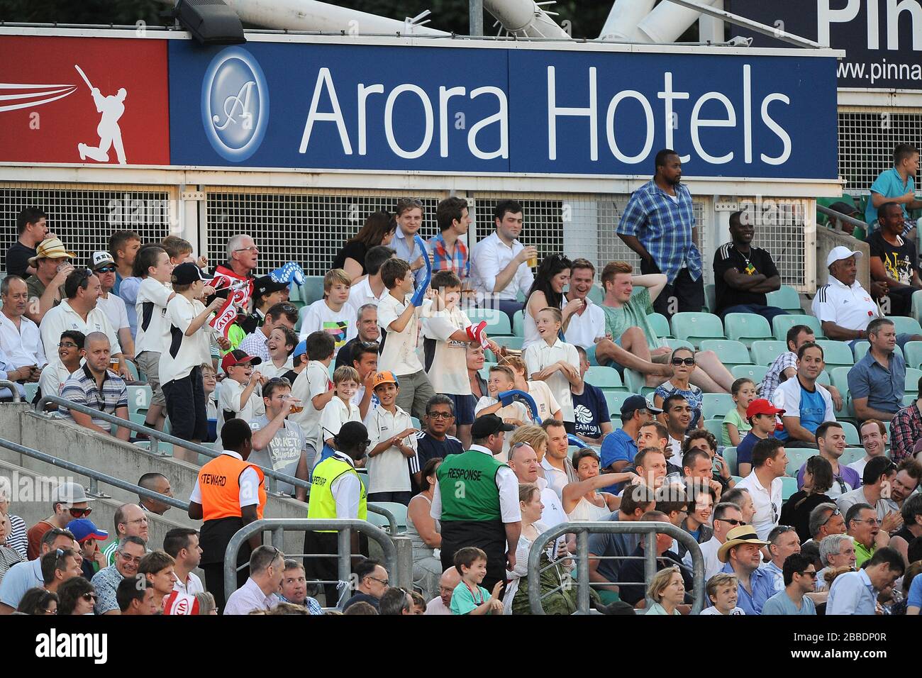 The crowd enjoy the action from the stands at the Kia Oval Stock Photo ...