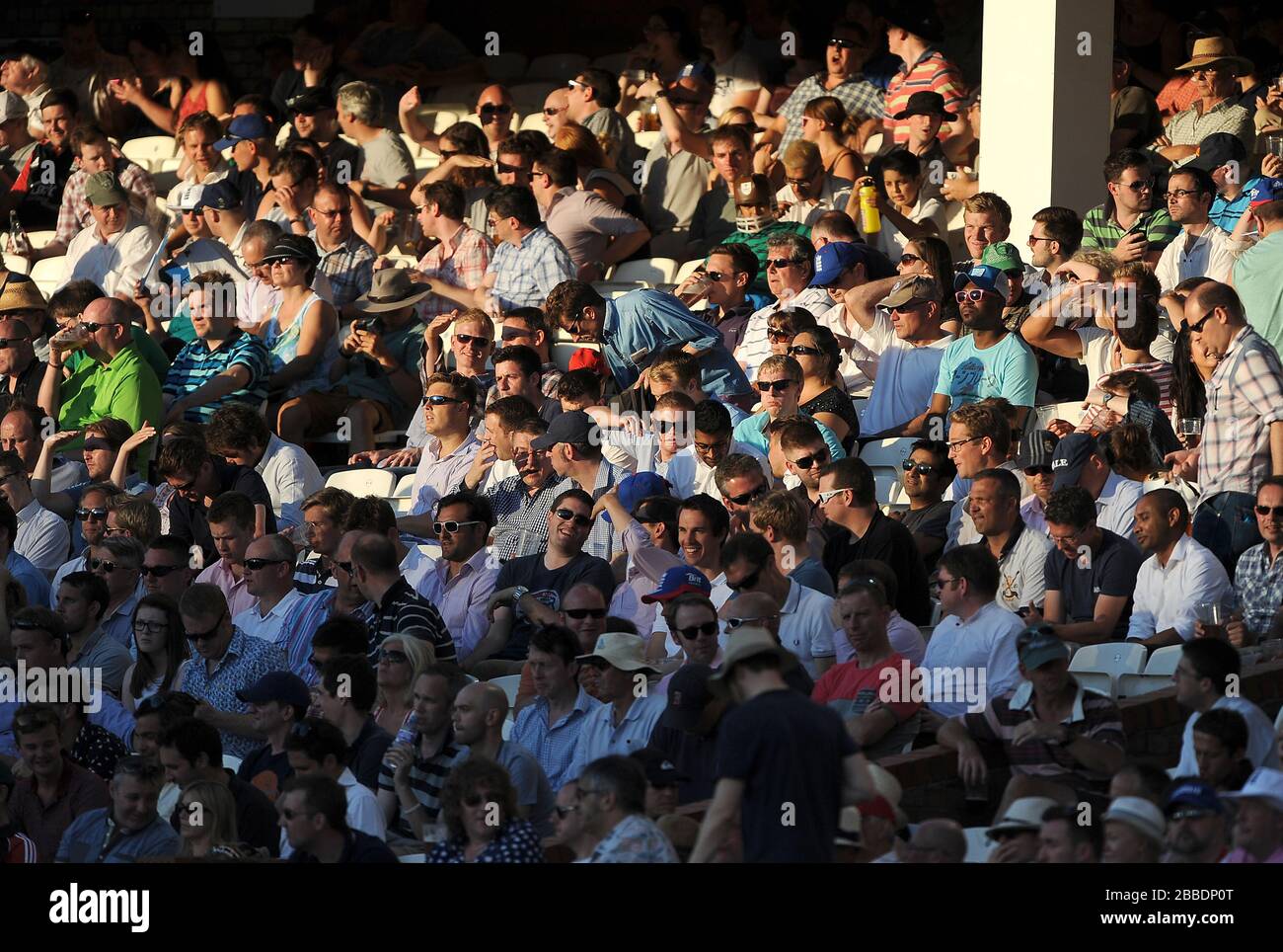 The crowd enjoy the action from the stands at the Kia Oval Stock Photo ...