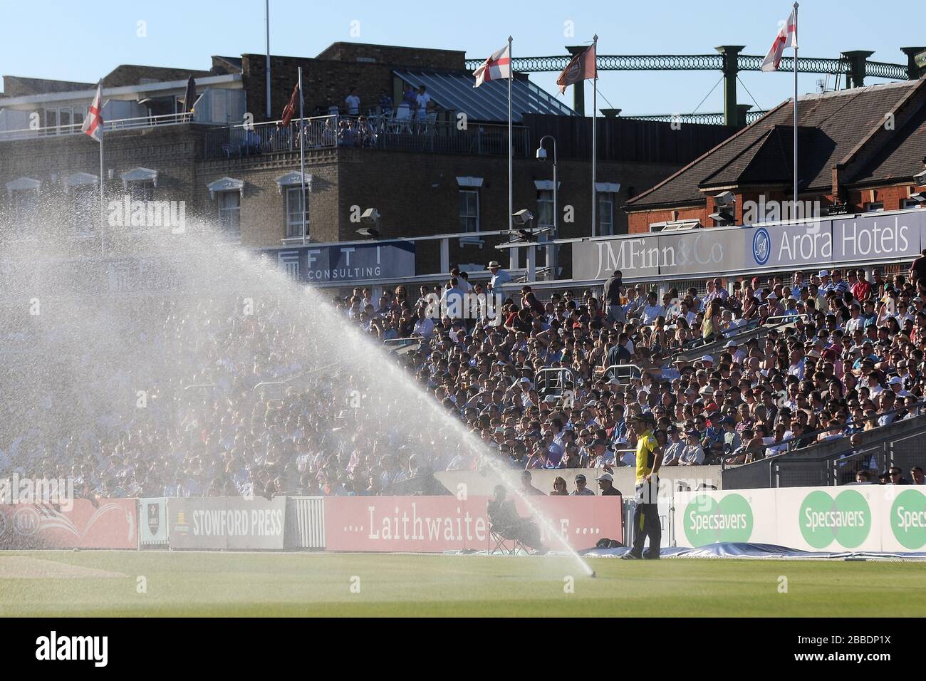 The crowd enjoy the action from the stands at the Kia Oval Stock Photo ...