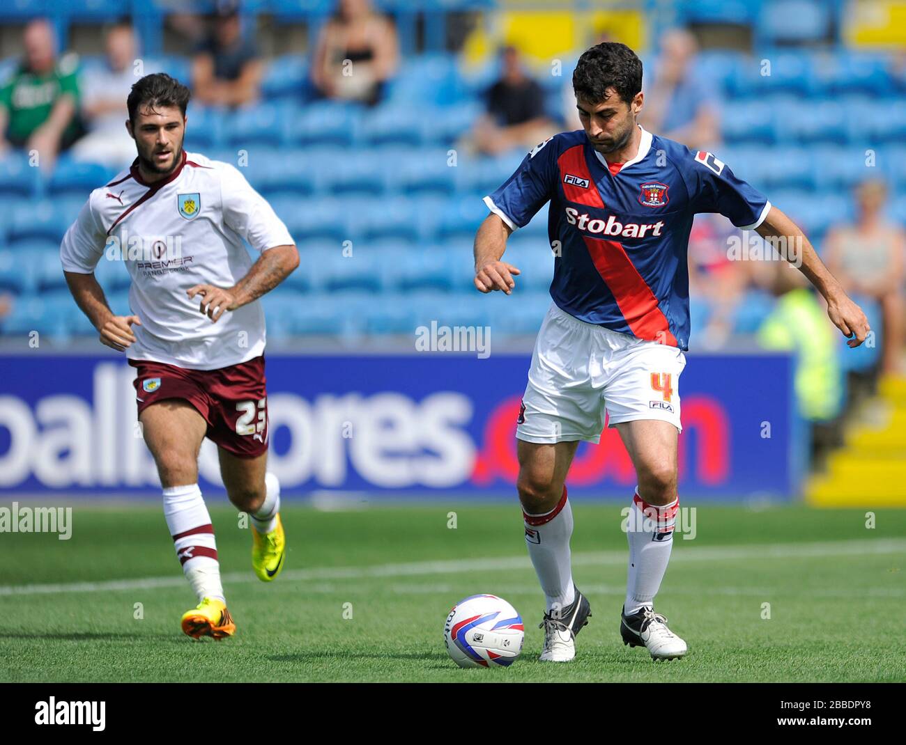 Charlie Austin, Burnley FC (Left) and Mike Edwards, Carlisle United ...