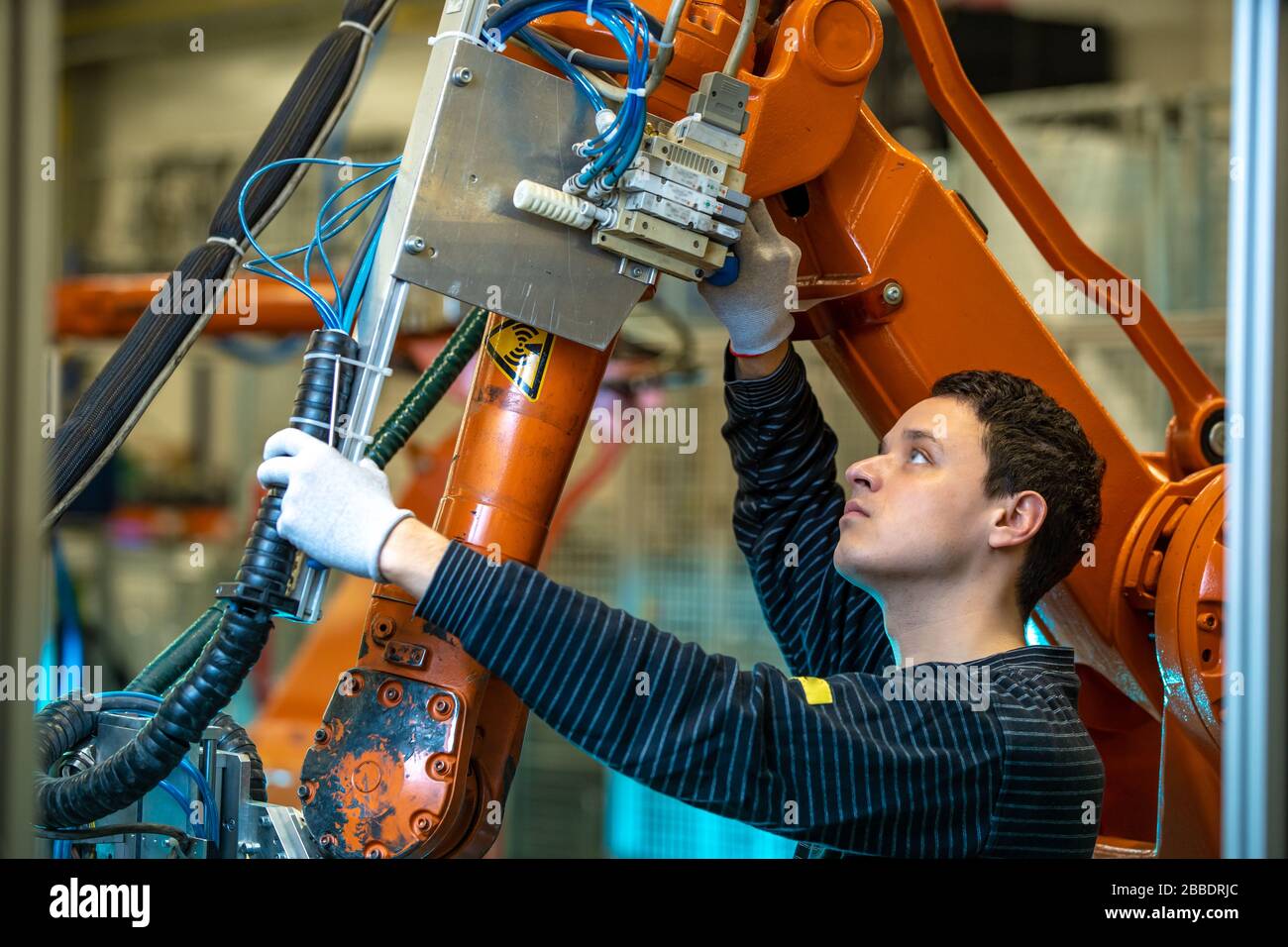 robotization of modern industry in the factory. Introduction of new ...