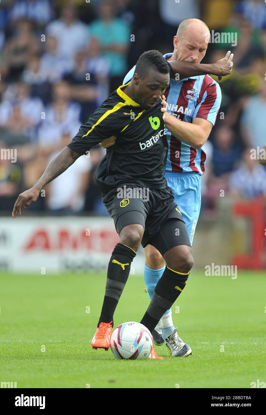 Scunthorpe United's David Mirfin and Sheffield Wednesday's Miguel Llera ...