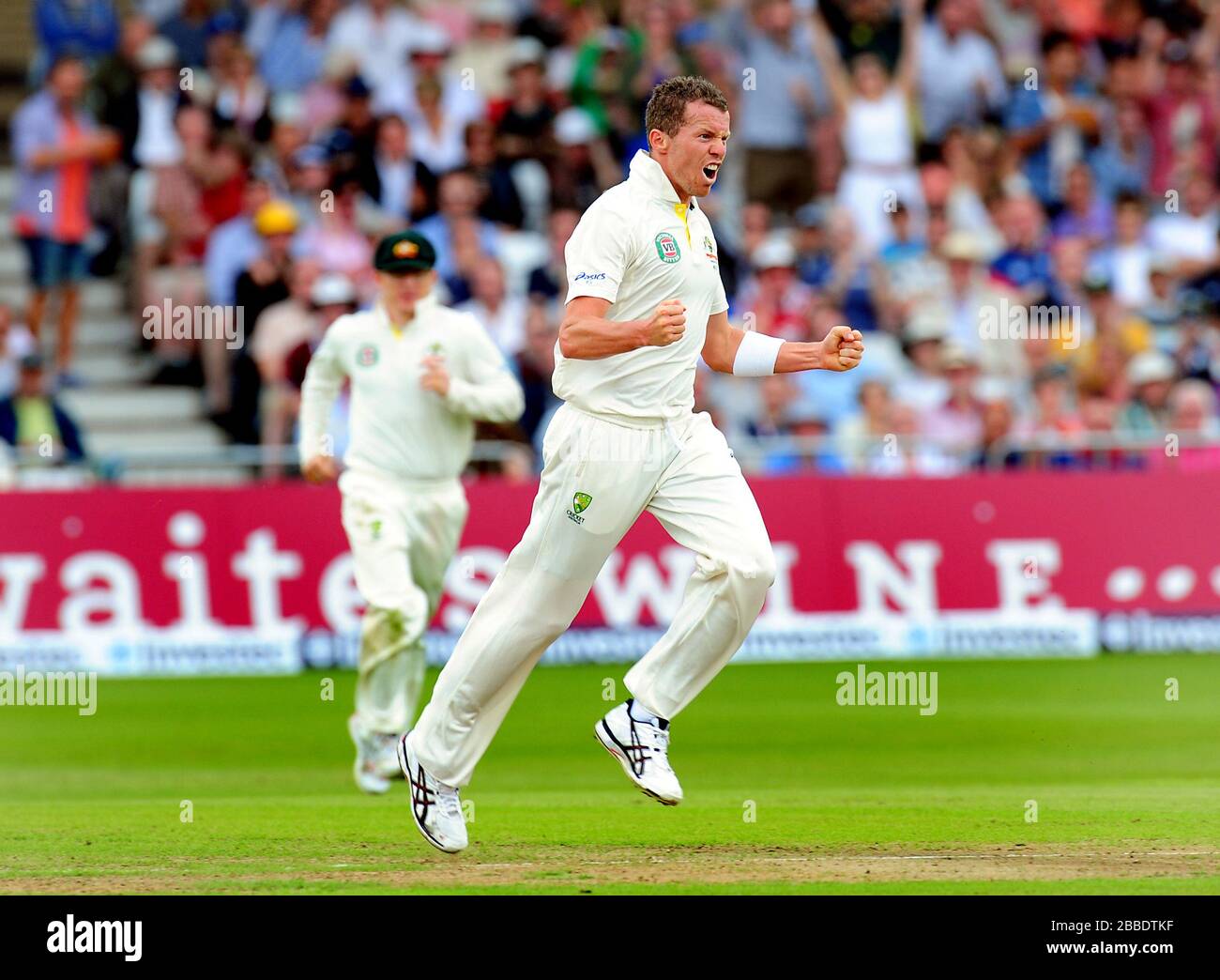 Australia's Peter Siddle celebrates after bowling Jonathan Trott for 48 ...