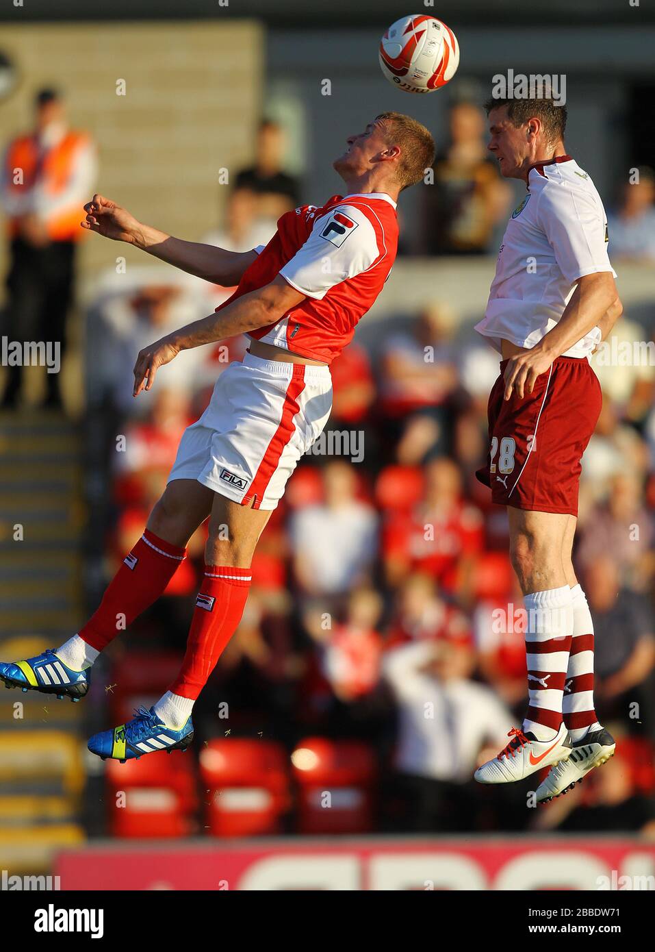 Morecambe's Jack Sampson and Burnley's Kevin Long Stock Photo - Alamy