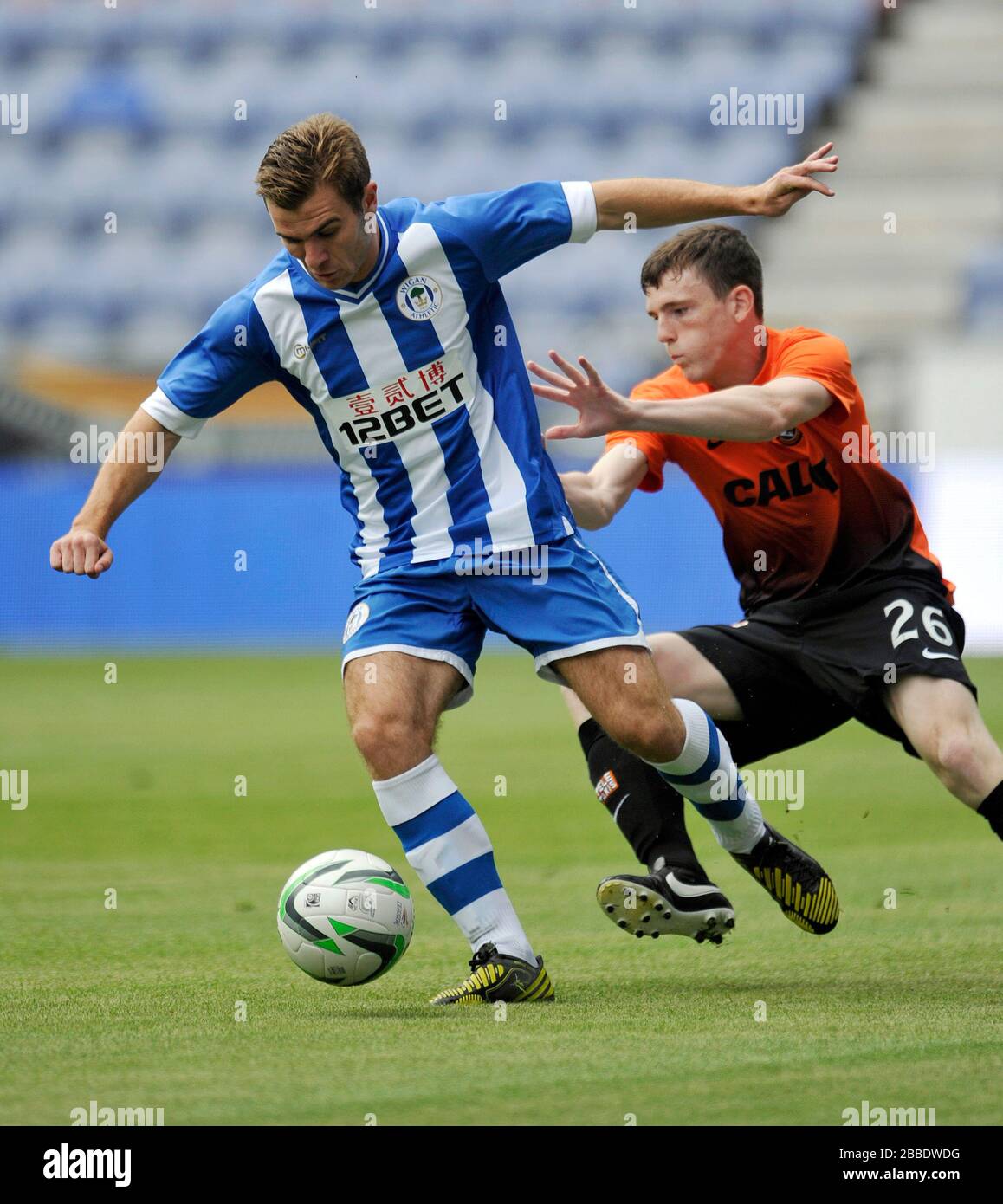 Dundee United's Andrew Robertson (R) and Wigan Athletic's Callum ...