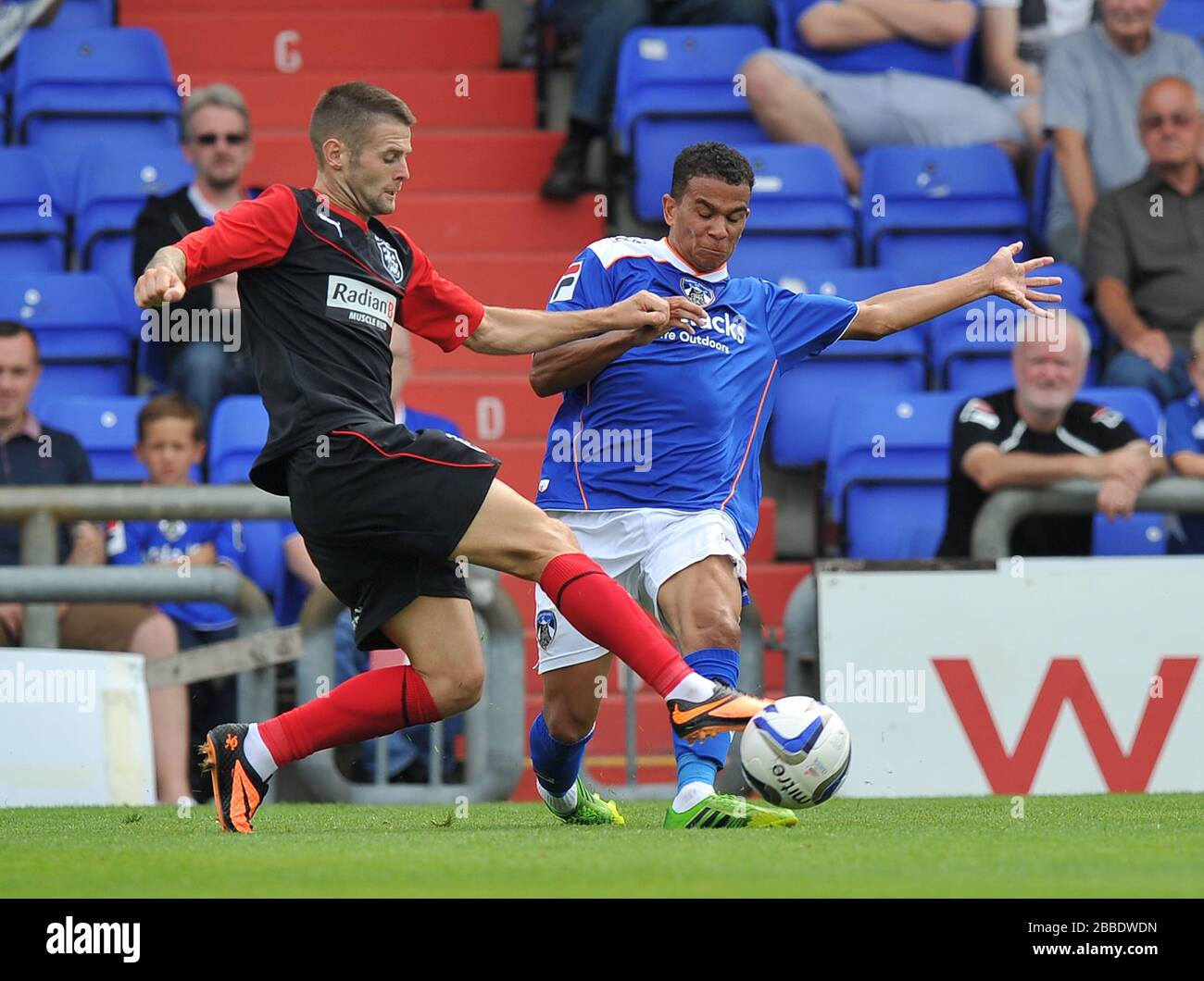 Huddersfield Town's Adam Hammill and Oldham Athletic's Connor Brown ...