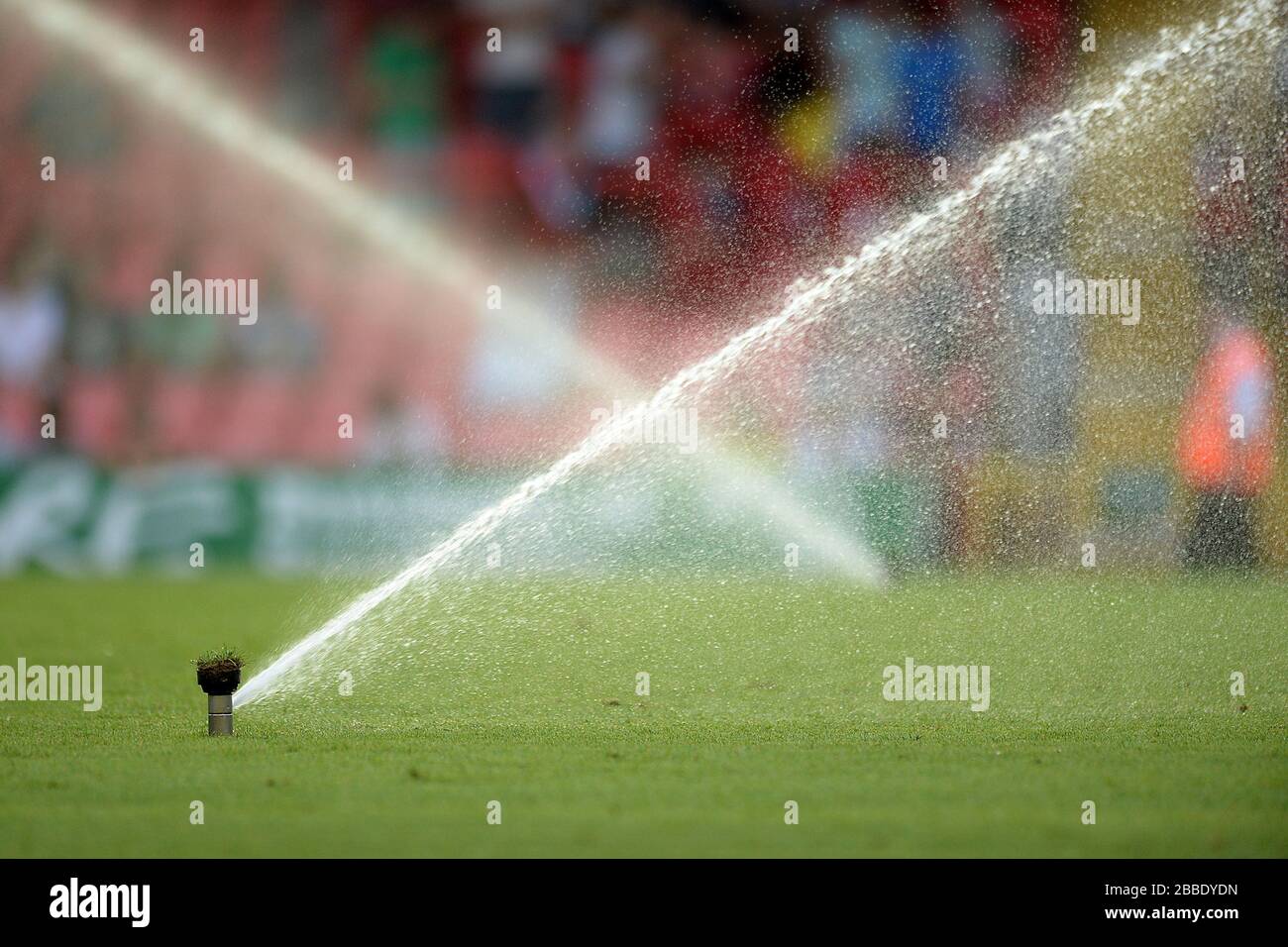 Watering football pitch hi-res stock photography and images - Alamy