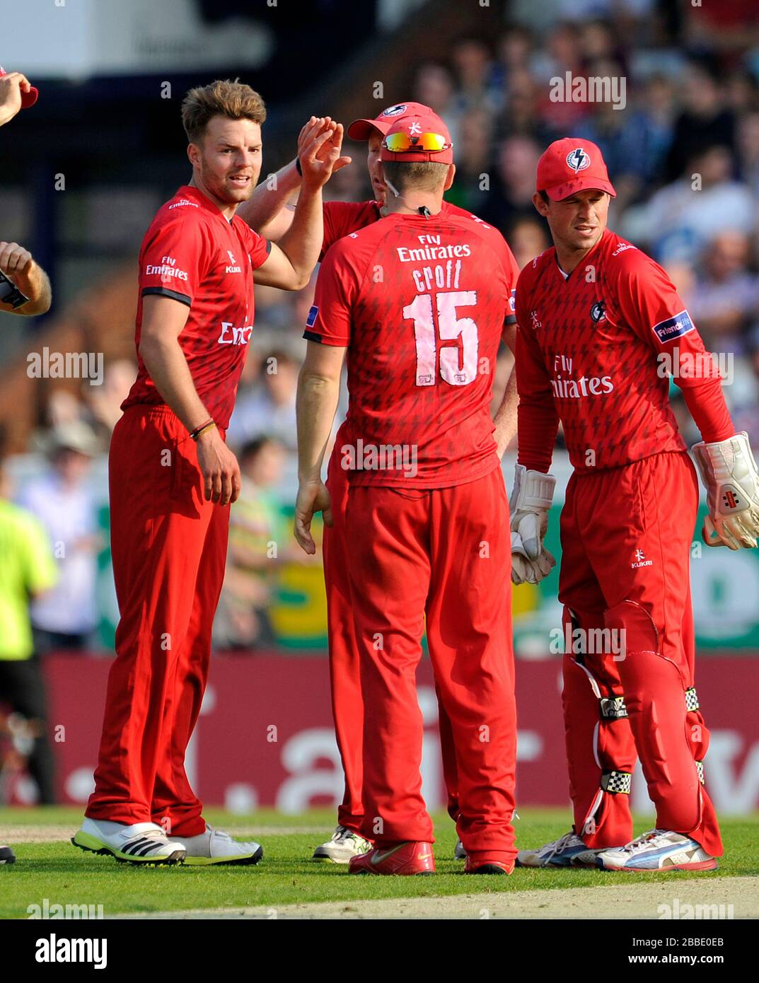 Lancashire Lightning's Arron Lilley (L) celebrates after he takes the ...