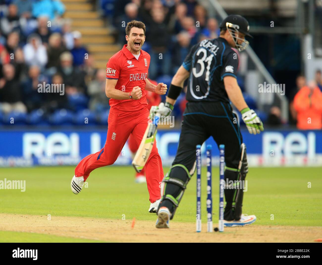 England's James Anderson celebrates clean bowling New Zealand's Martin ...
