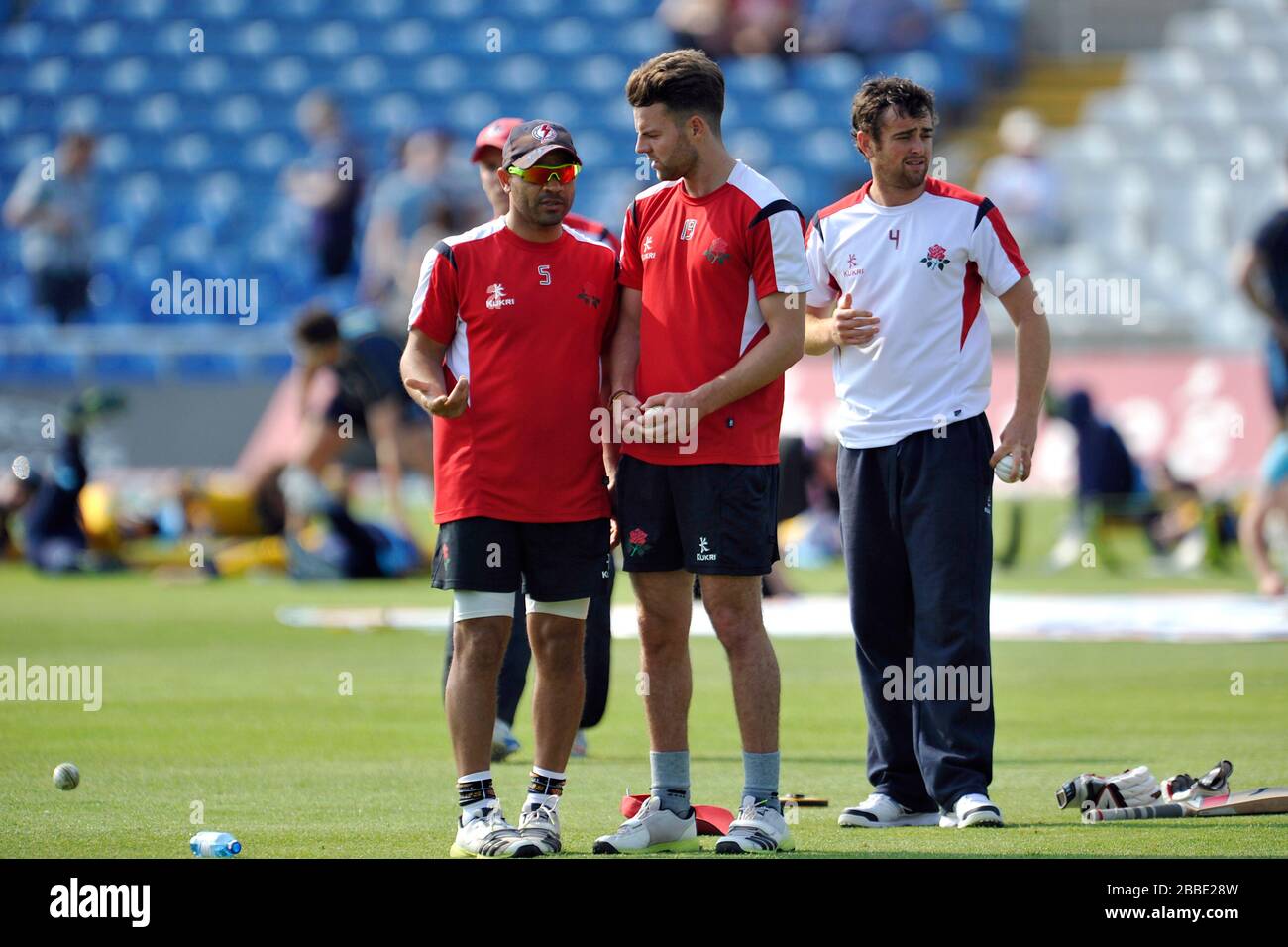 Lancashire's Arron Lilley (right) speaks with teammate Ashwell Prince ...