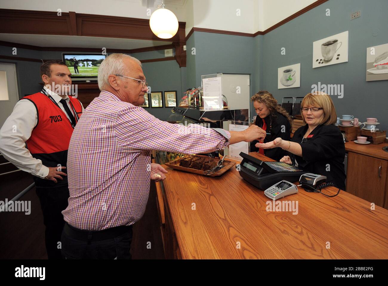 Staff serve fans in a coffee shop in the presidents tea room inside the ...