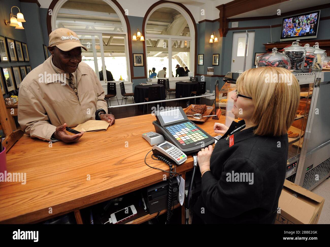 Staff serve fans in a coffee shop in the presidents tea room inside the ...