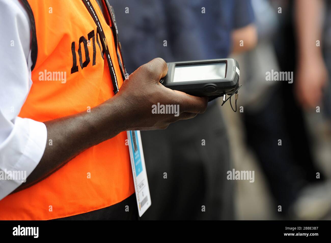 Stewards scan tickets as fans enter the Kia Oval Stock Photo - Alamy
