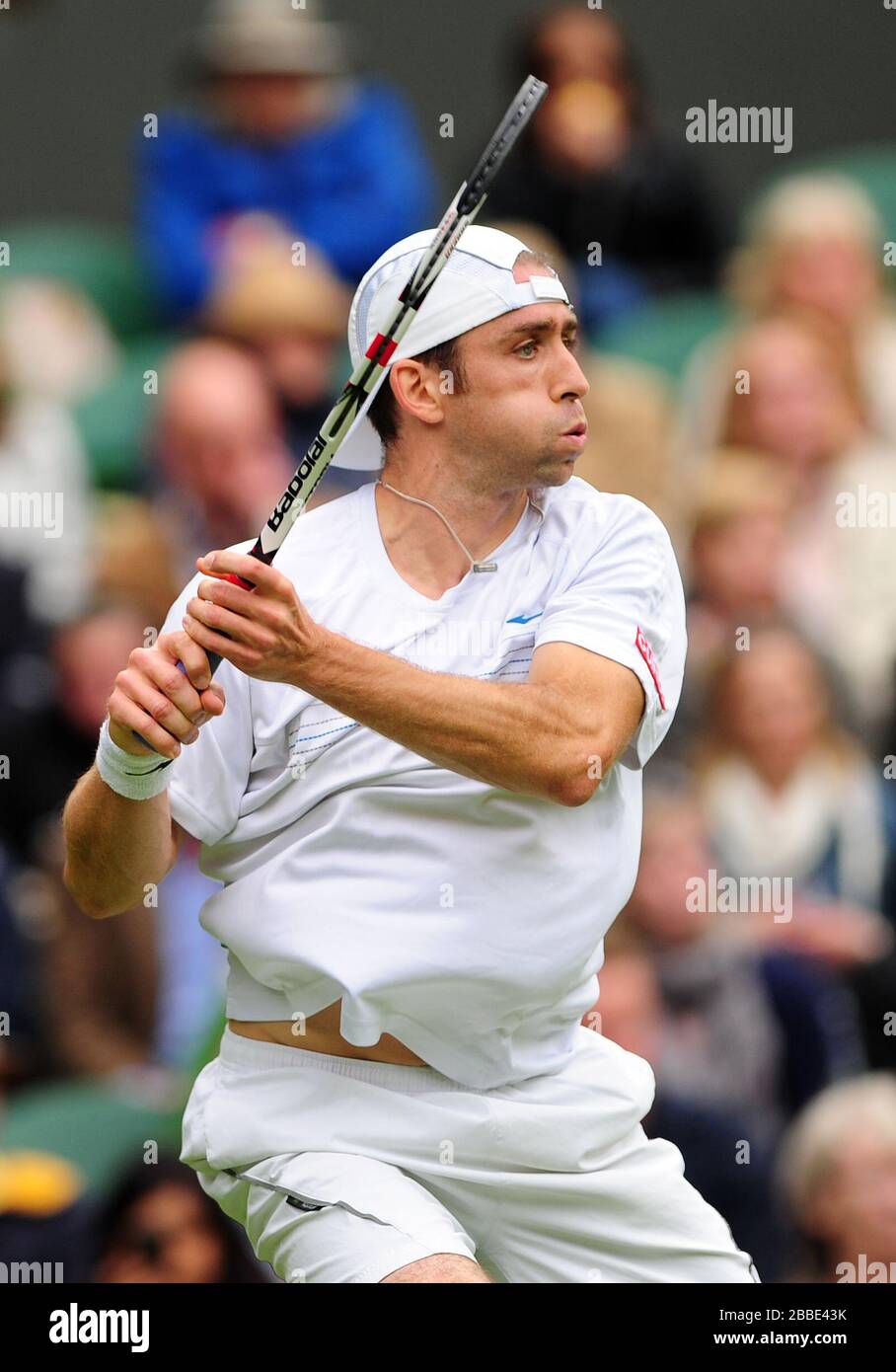 Germany's Benjamin Becker in action against Great Britain's Andy Murray ...