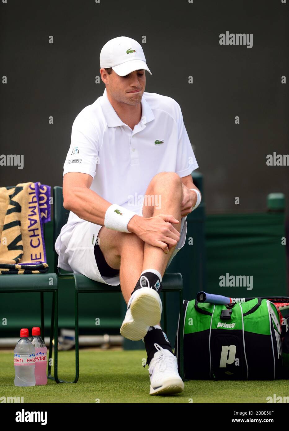 USA's John Isner struggles with an injury before retiring from his ...