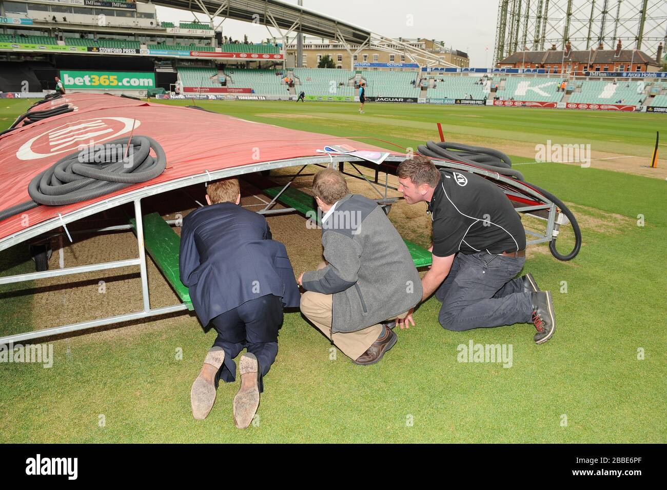Paul Joseph and Adam Joseph with Surrey's head groundsman Lee Fortis ...