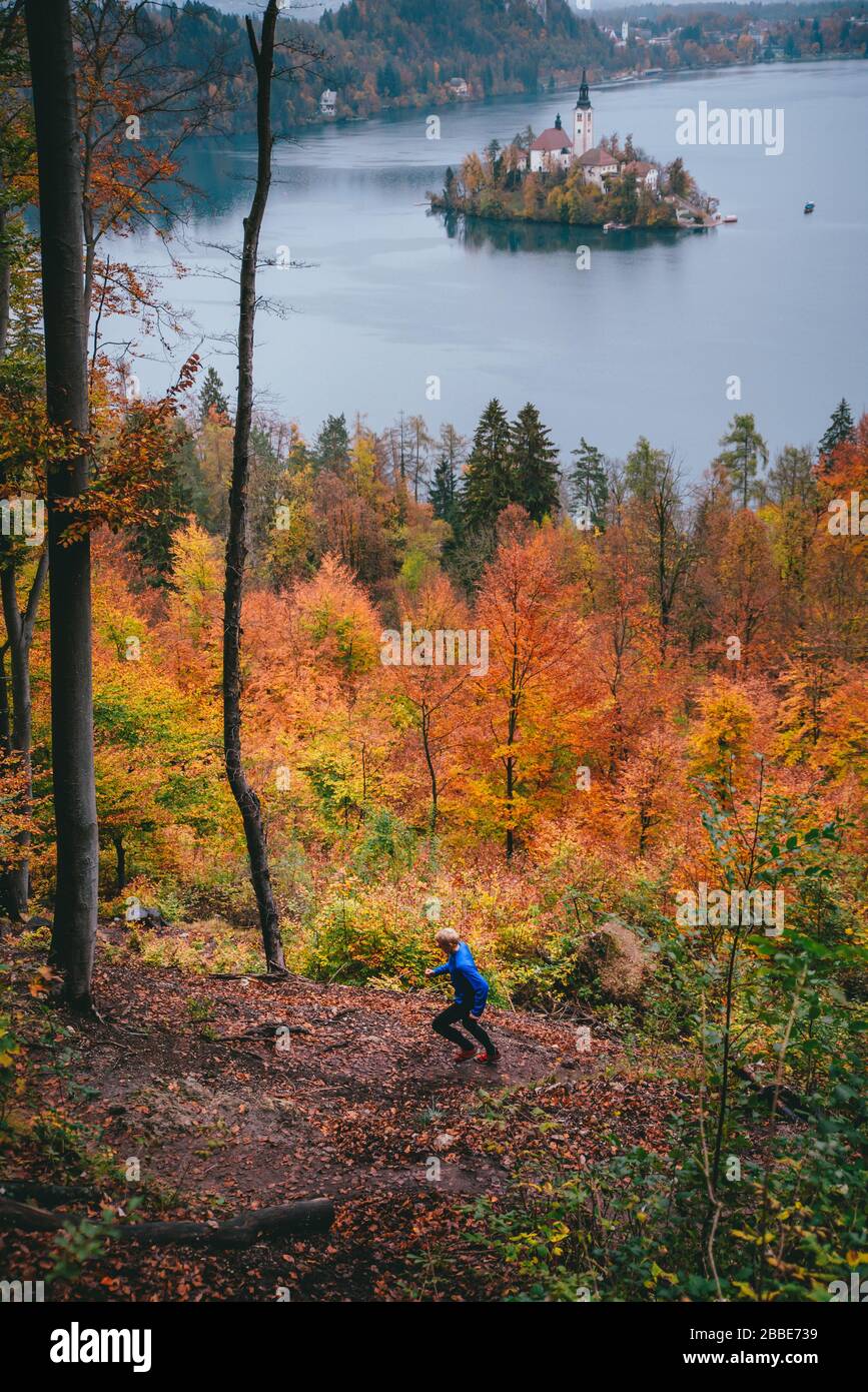 Female running in forest near hi-res stock photography and images - Alamy