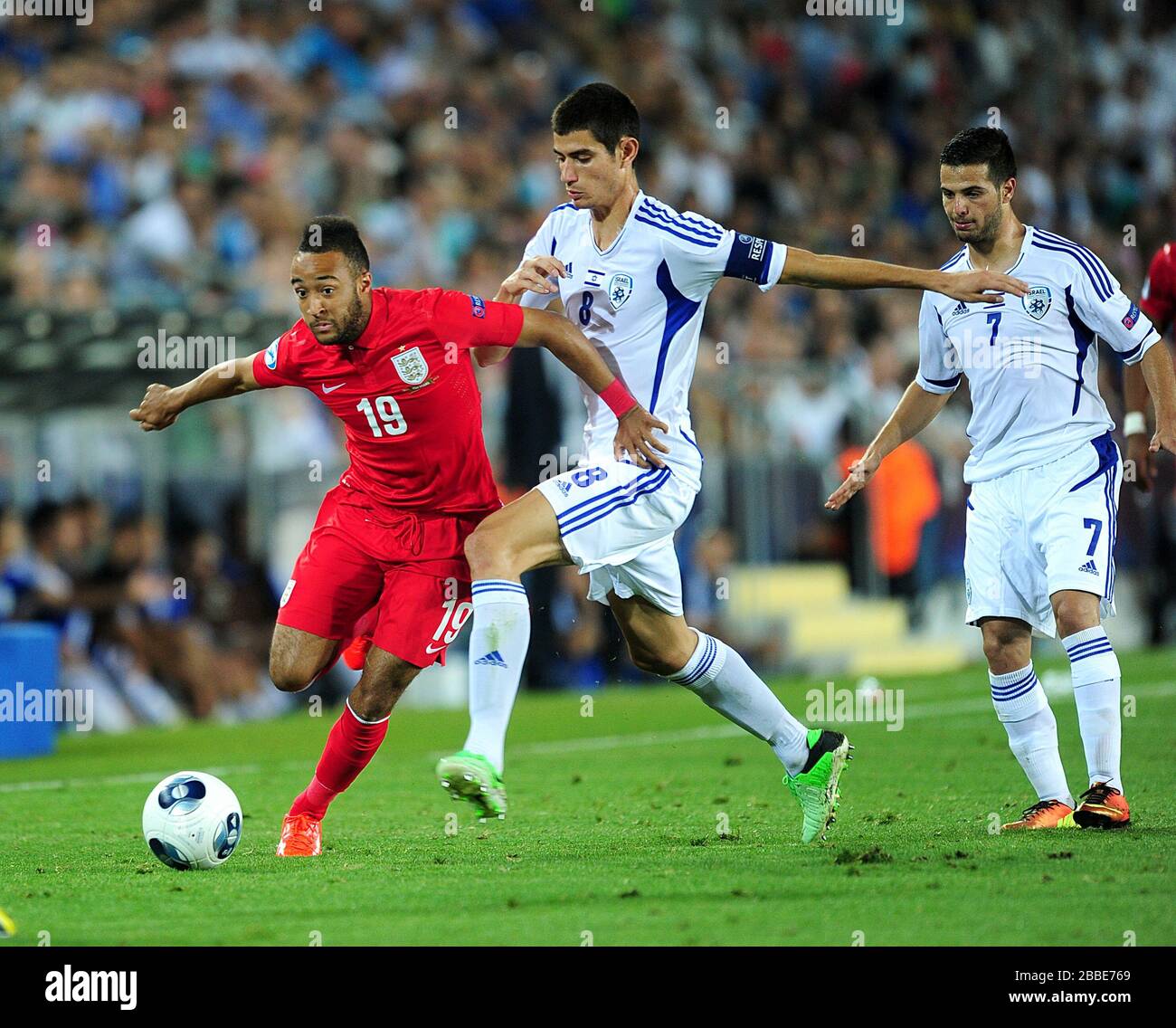 England's Nathan Redmond (left) and Israel's Nir Biton battle for the ...