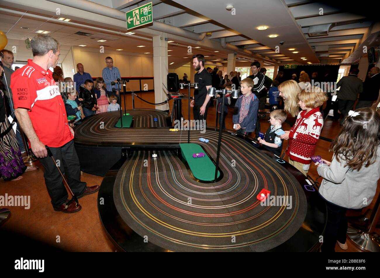 A scalextric activity inside at Sandown Park Racecourse Stock Photo - Alamy