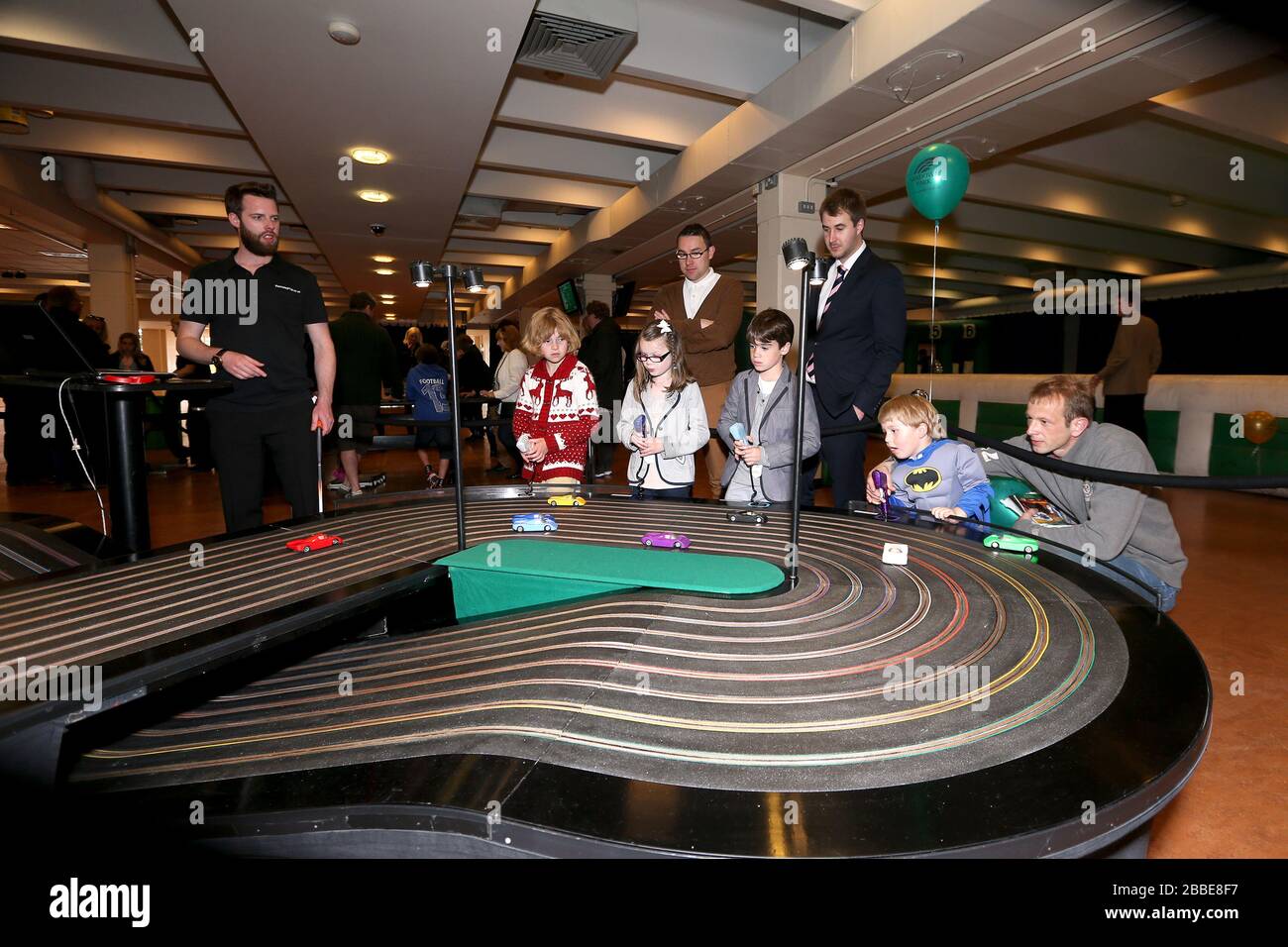 A scalextric activity inside at Sandown Park Racecourse Stock Photo - Alamy