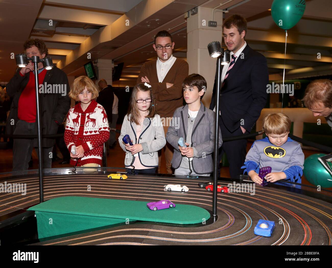 A scalextric activity inside at Sandown Park Racecourse Stock Photo - Alamy