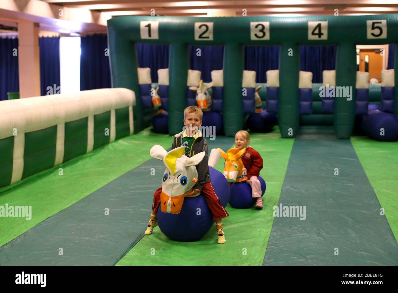 A children's activity inside at Sandown Park Racecourse Stock Photo - Alamy