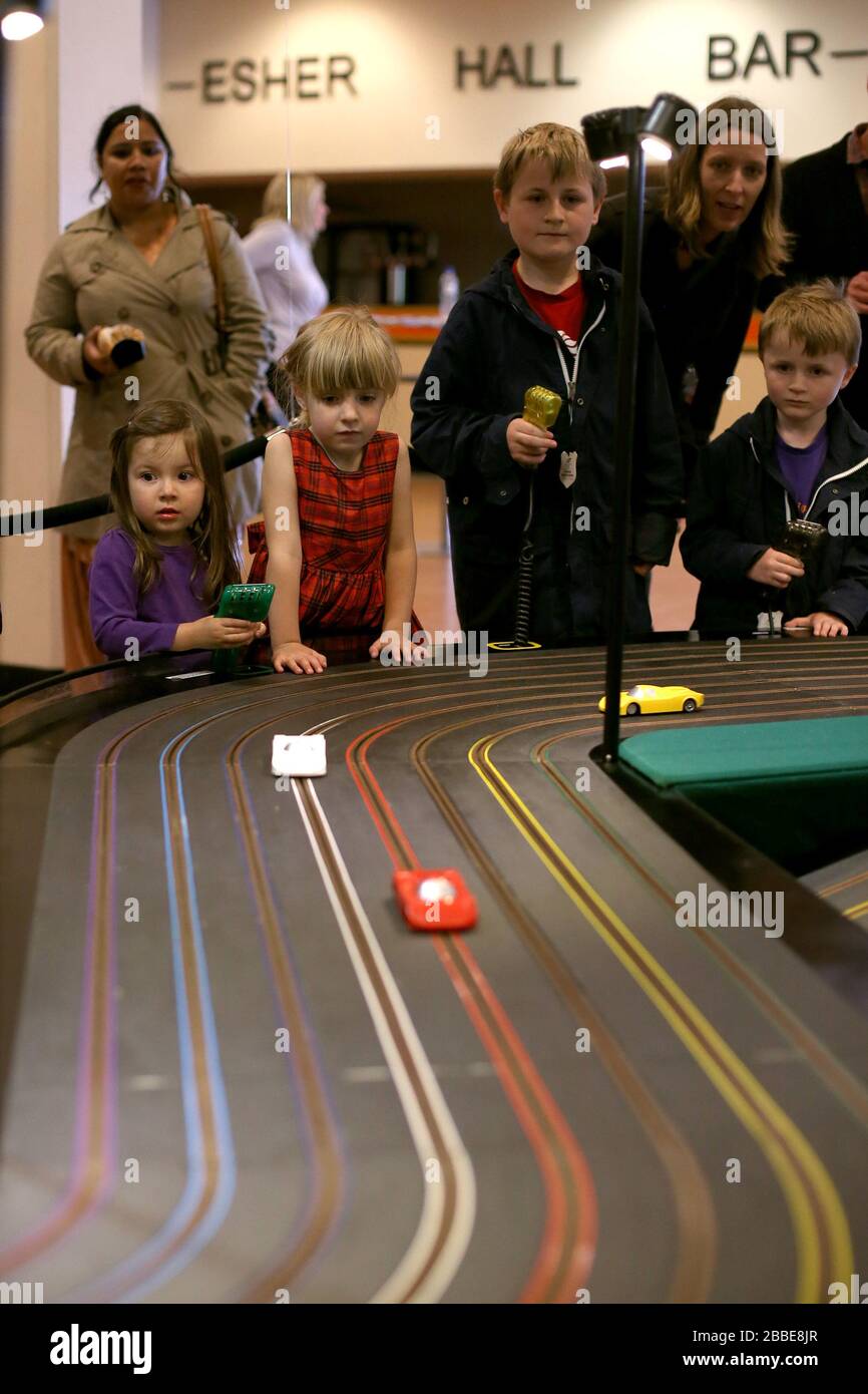 A scalextric activity inside at Sandown Park Racecourse Stock Photo - Alamy
