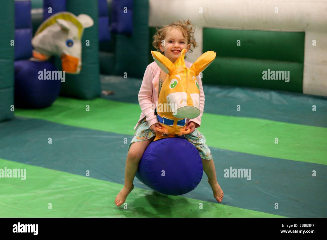 A children's activity inside at Sandown Park Racecourse Stock Photo - Alamy